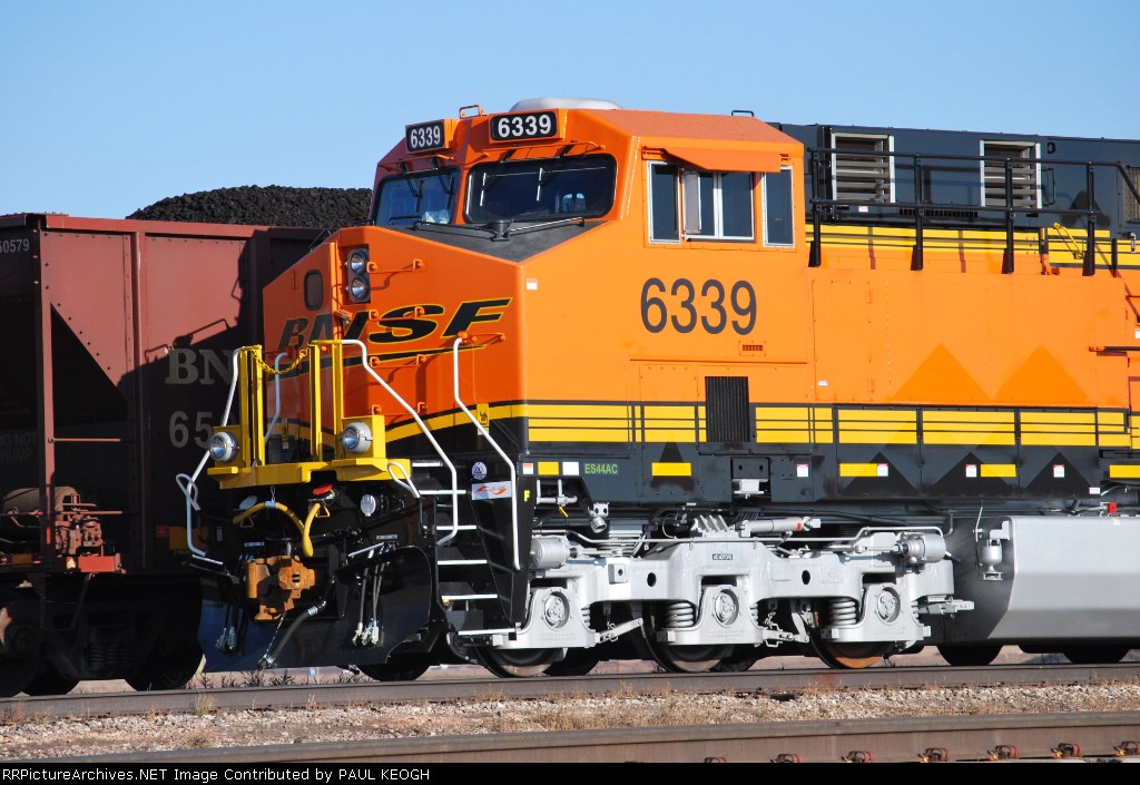 BNSF 6339 up close with her Road Number Lights lighting up in the bright sunlight at Cabello and ...